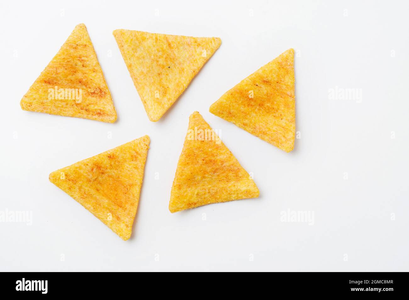 triangle chips isolated on white background Stock Photo - Alamy