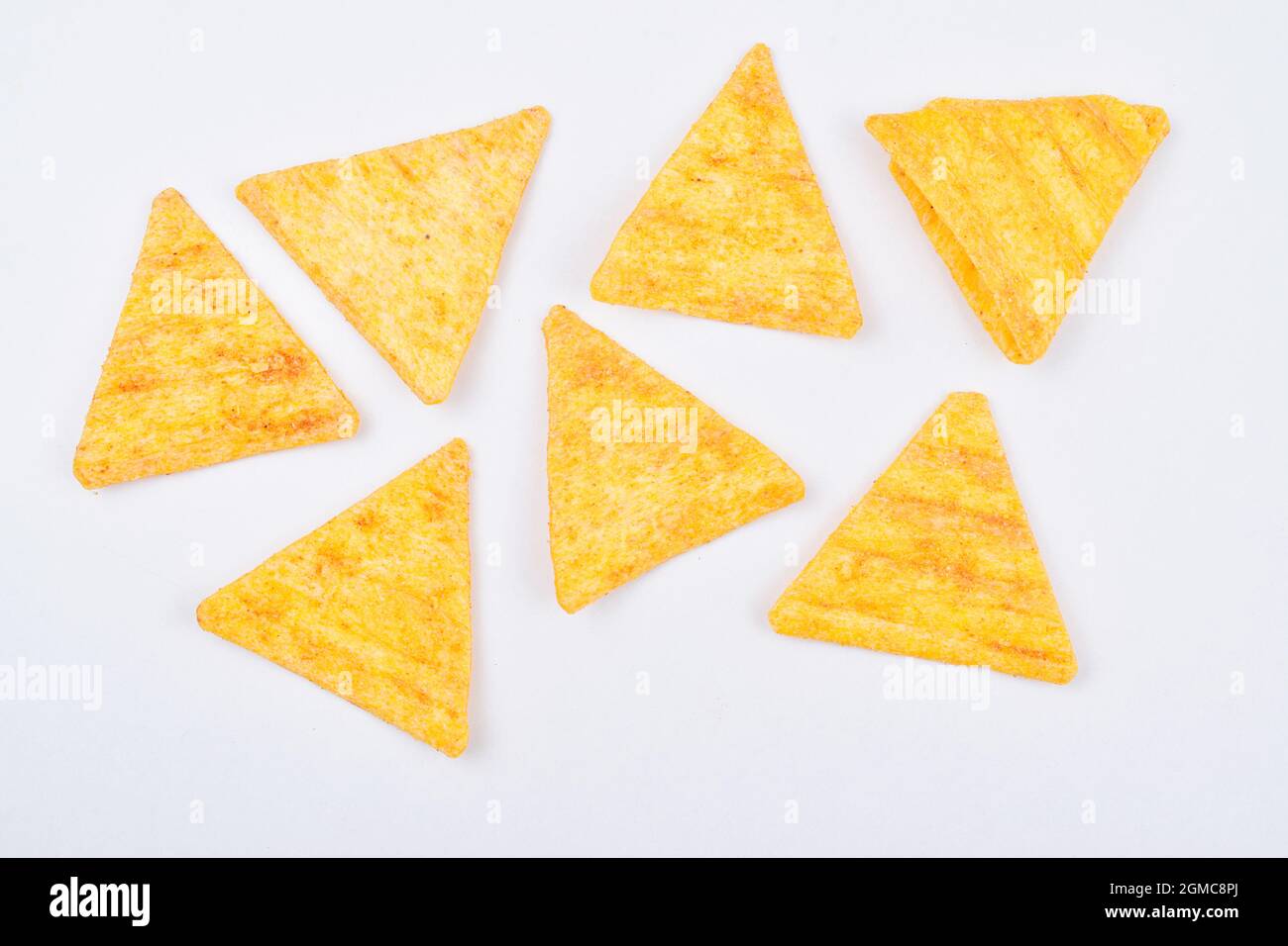 Top view of triangle chips on white background, unhealthy food Stock ...