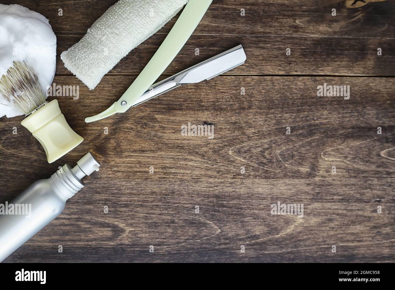 Shaving accessories on a wooden texture background. Tools. Disposable ...