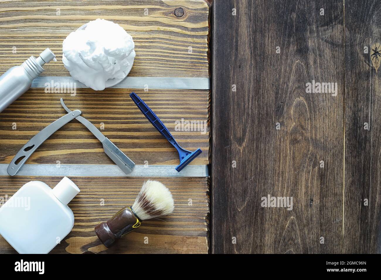 Shaving accessories on a wooden texture background. Tools. Disposable ...