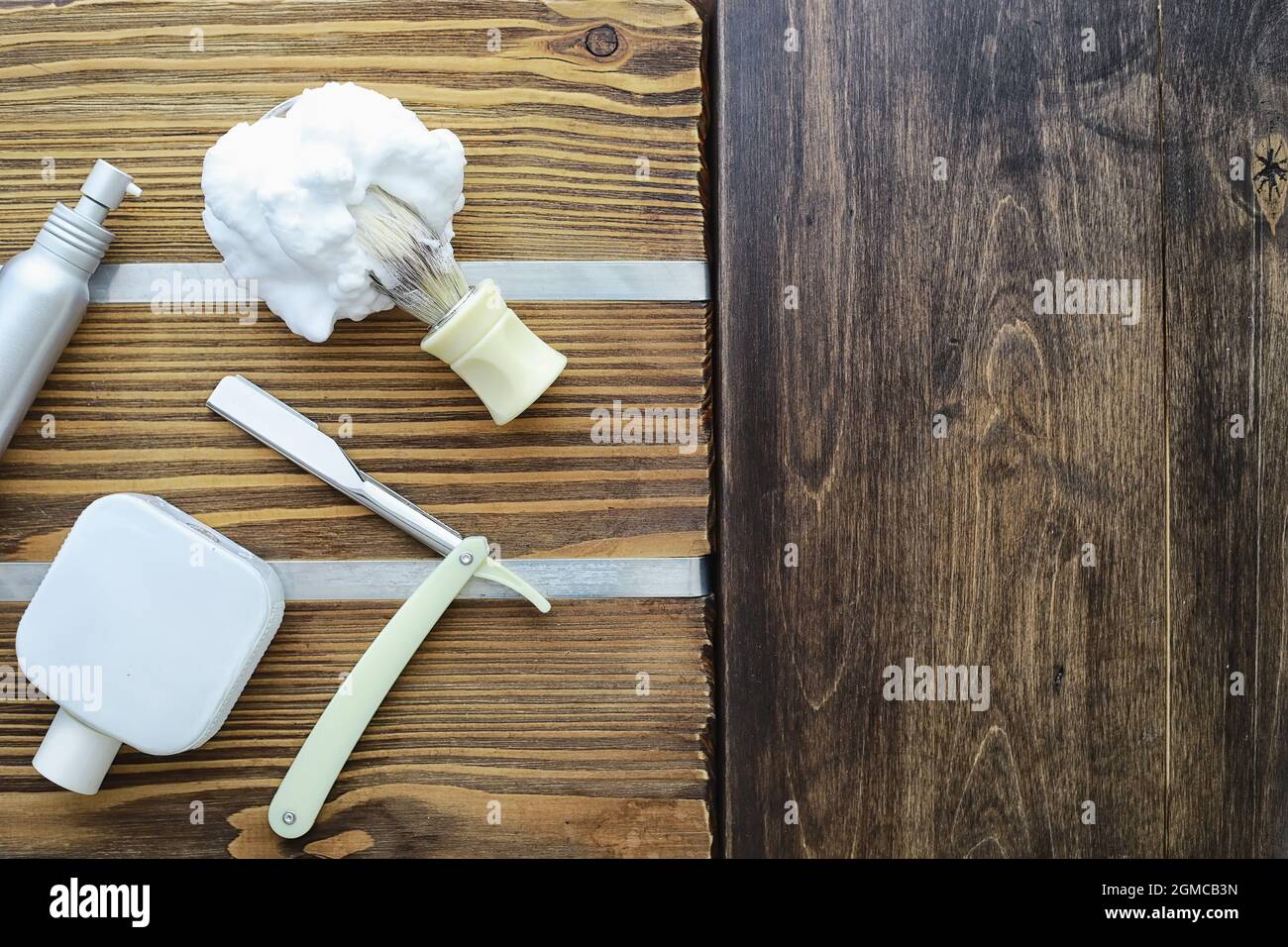 Shaving accessories on a wooden texture background. Tools. Disposable ...