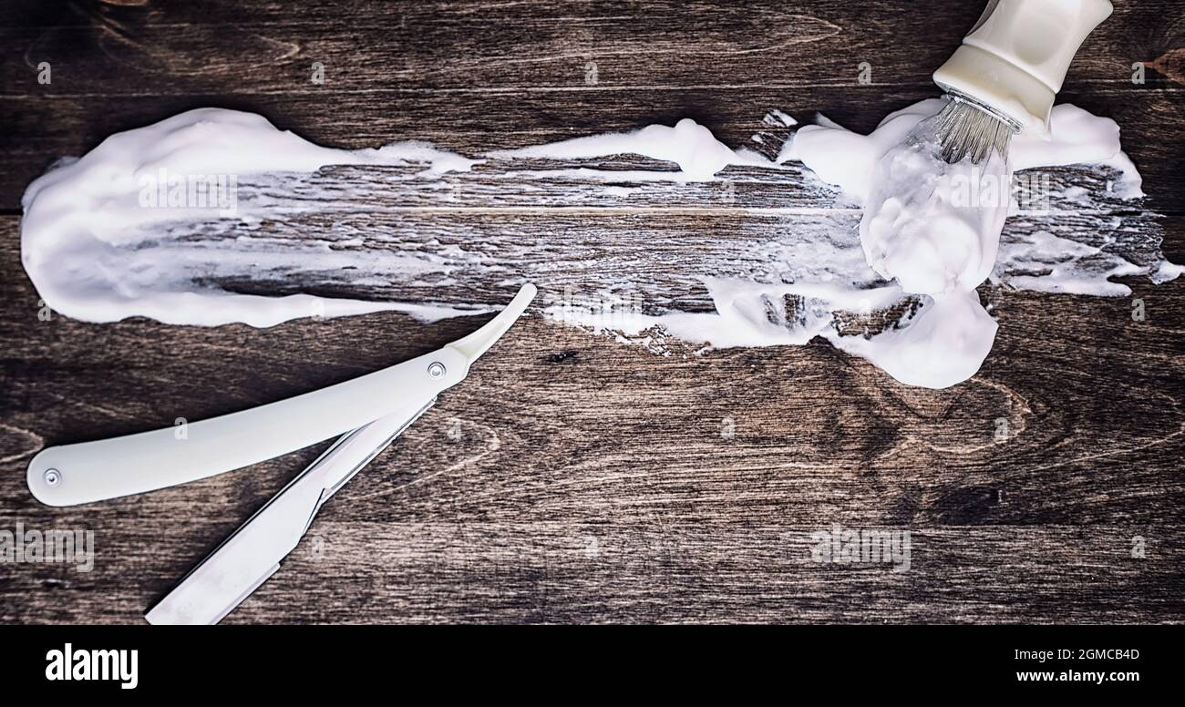 Shaving accessories on a wooden texture background. Tools. Disposable ...