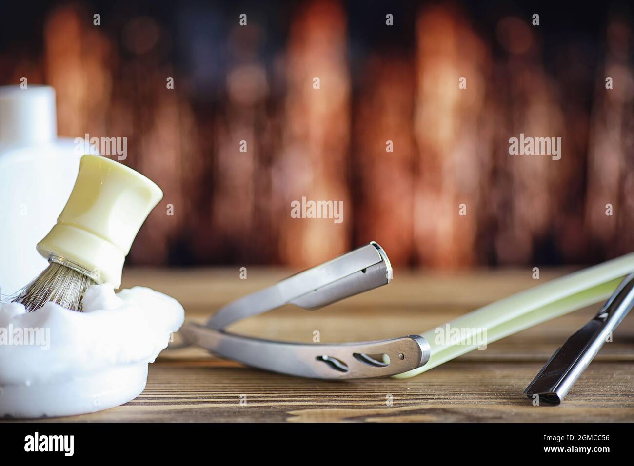 Shaving accessories on a wooden texture background. Tools. Disposable ...