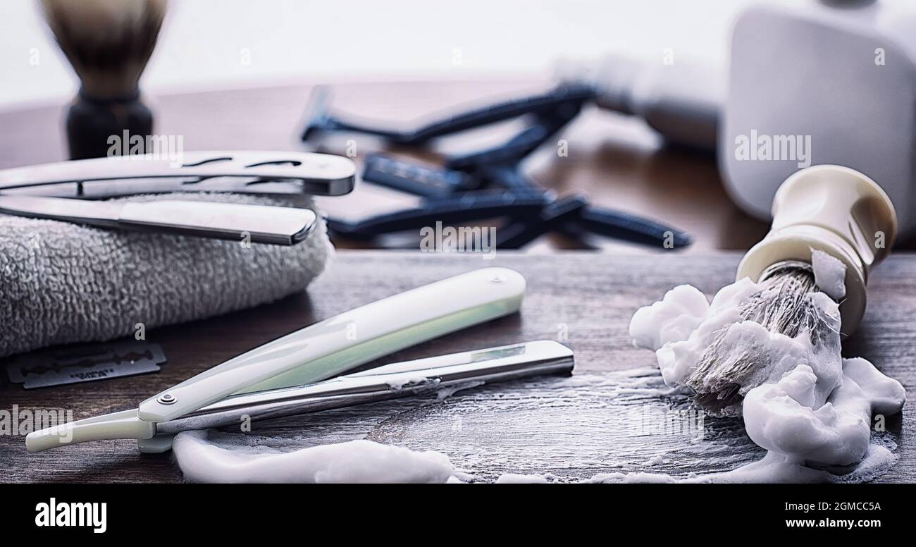 Shaving accessories on a wooden texture background. Tools. Disposable ...