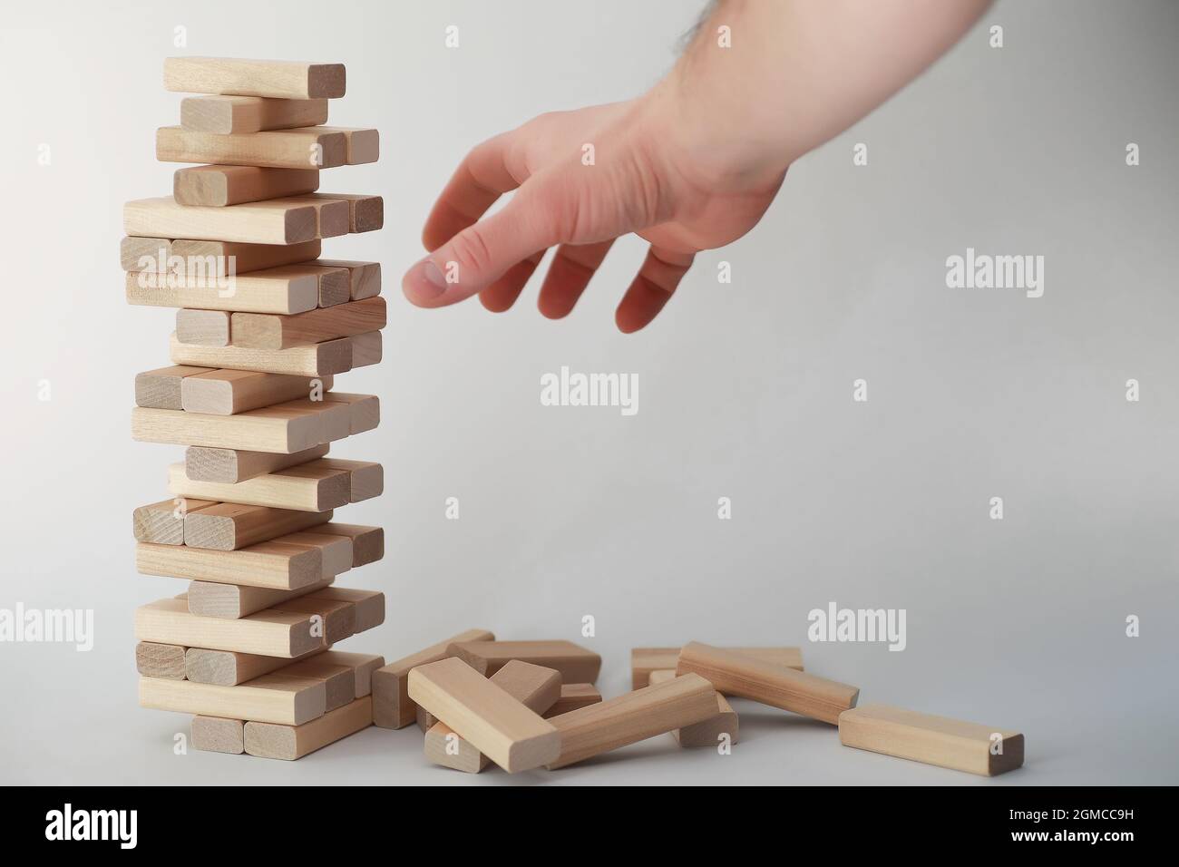 Board game jenga tower of light wood sticks Stock Photo - Alamy