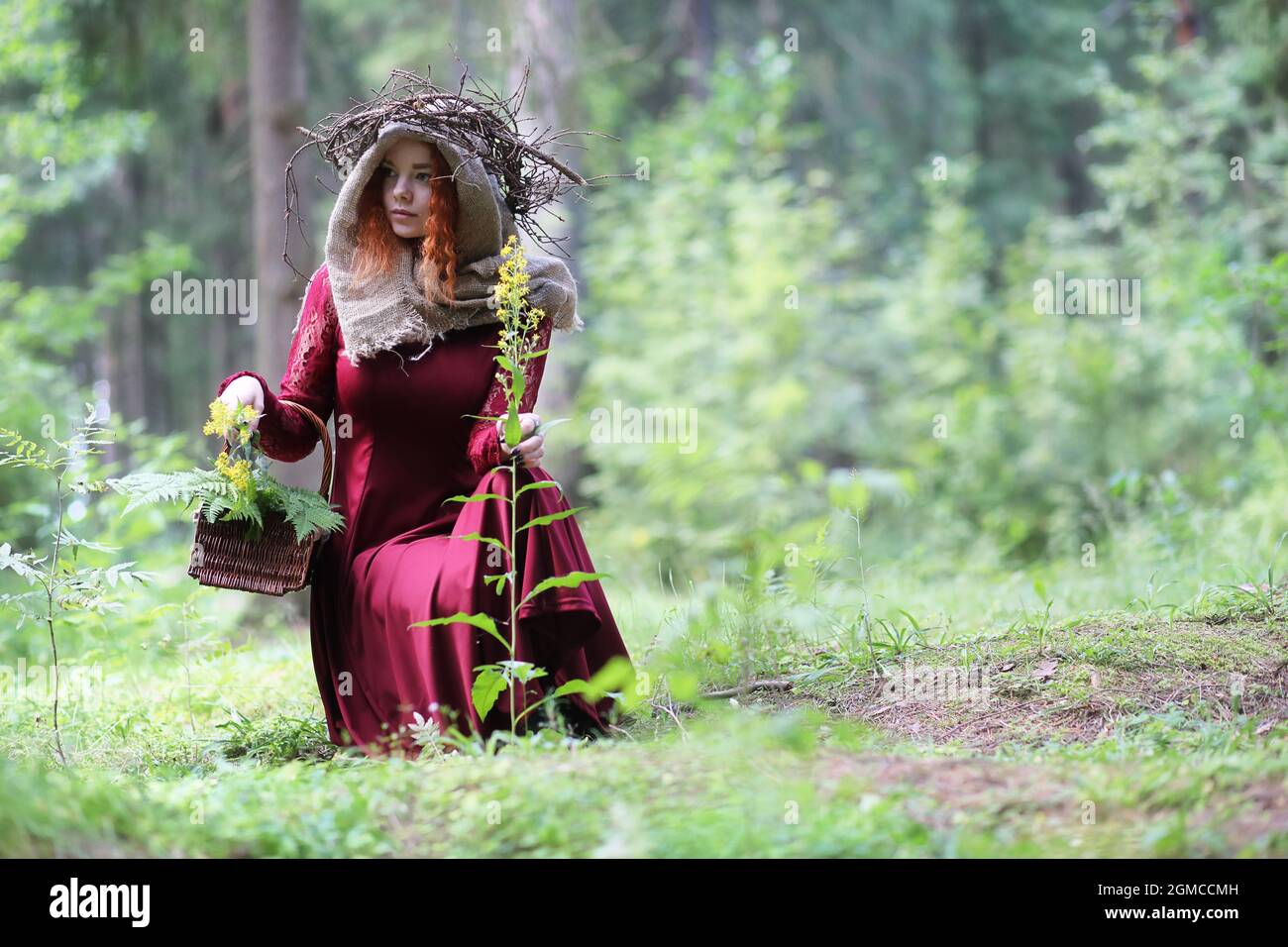 Fortune-teller conducts a ritual in the depths of the forest Stock ...