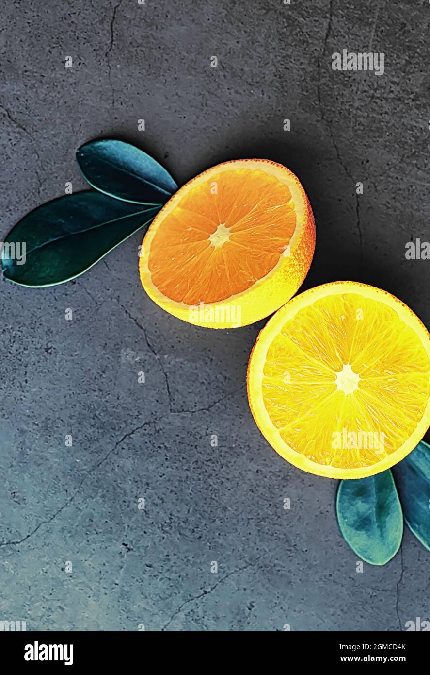 Orange citrus fruit on stone table. Orange background Stock Photo - Alamy