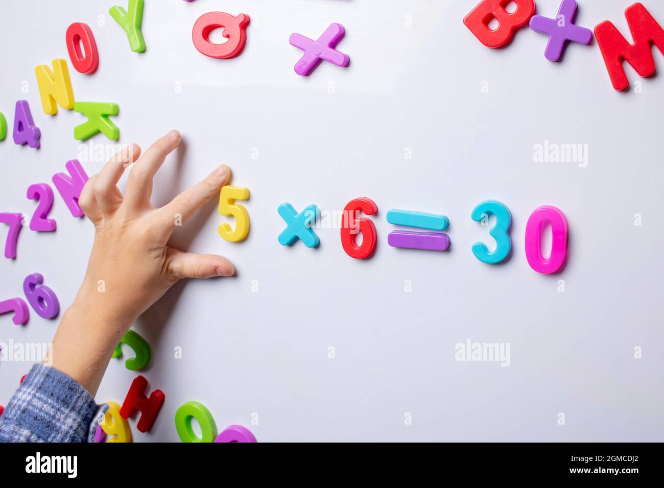 Little boy calculating, numbers on school blackboard Stock Photo - Alamy