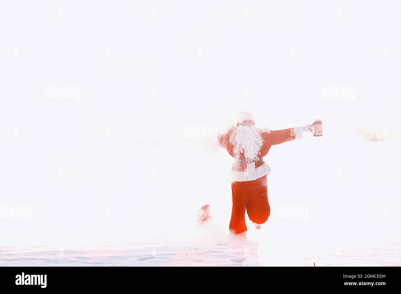 Santa in the winter field. Santa magical fog walking along the field ...