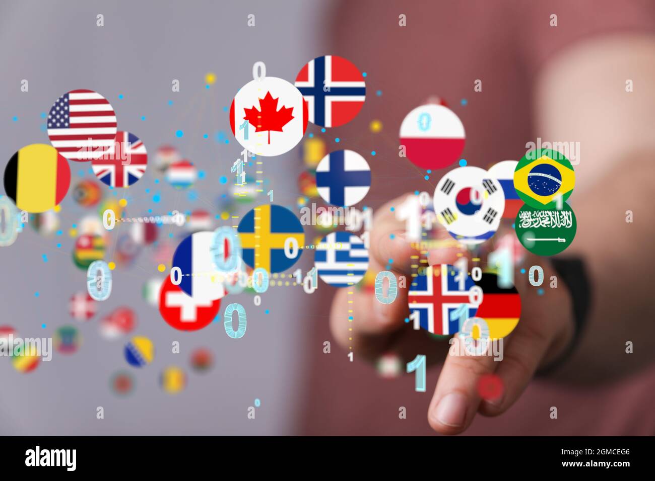 Man tapping on a 3D rendering of flags and binary code - international ...