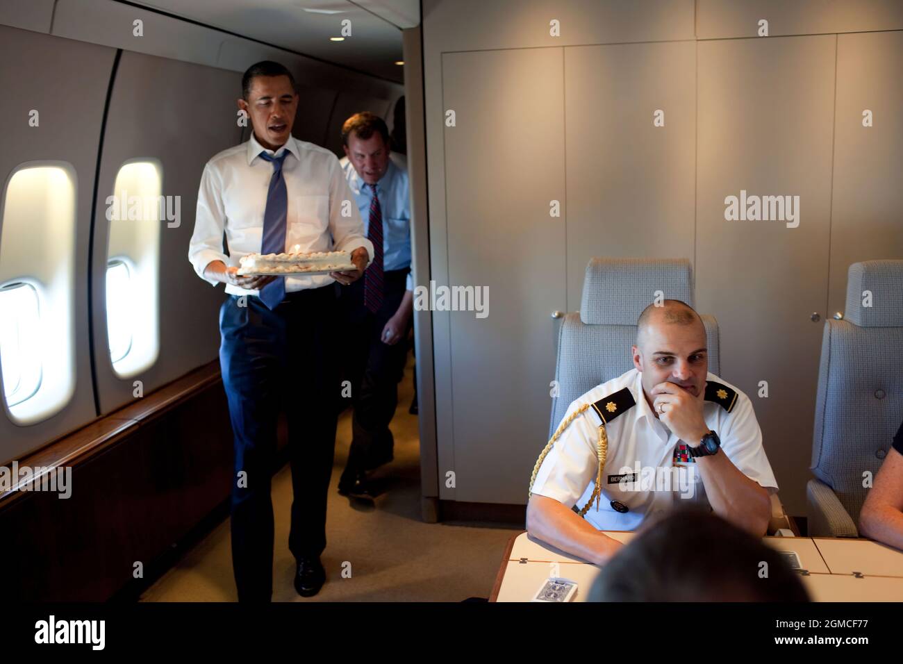 President Barack Obama presents a birthday cake to Military Aide Major ...