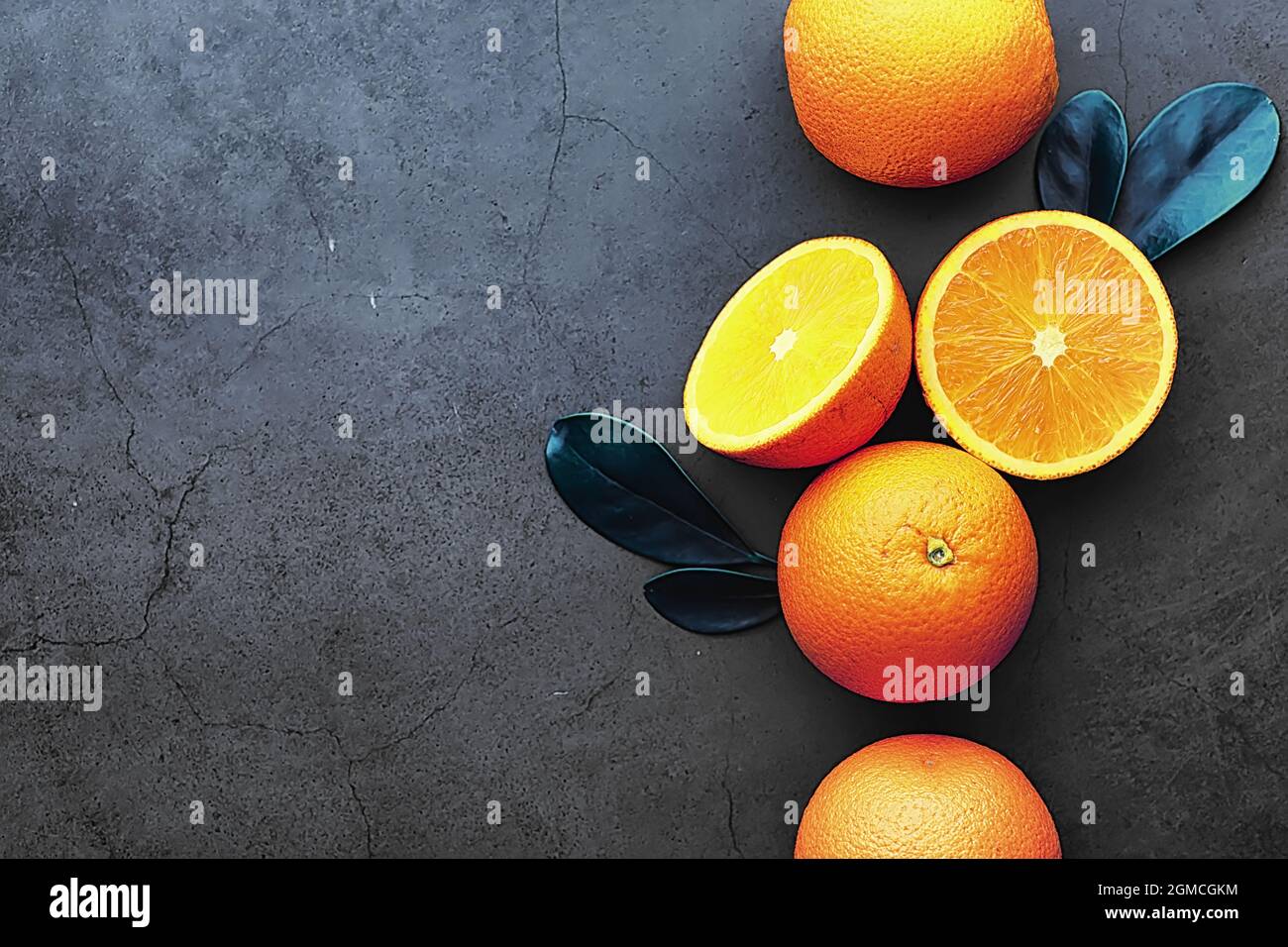 Orange citrus fruit on stone table. Orange background Stock Photo - Alamy