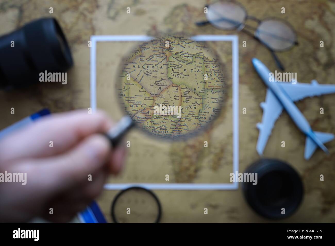 Travel concept. Map on the table and model aircraft Stock Photo - Alamy