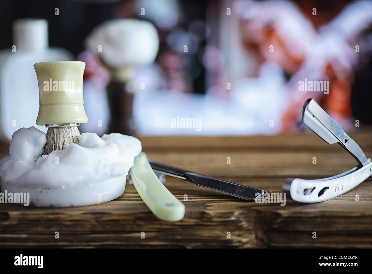 Shaving accessories on a wooden texture background. Tools. Disposable ...