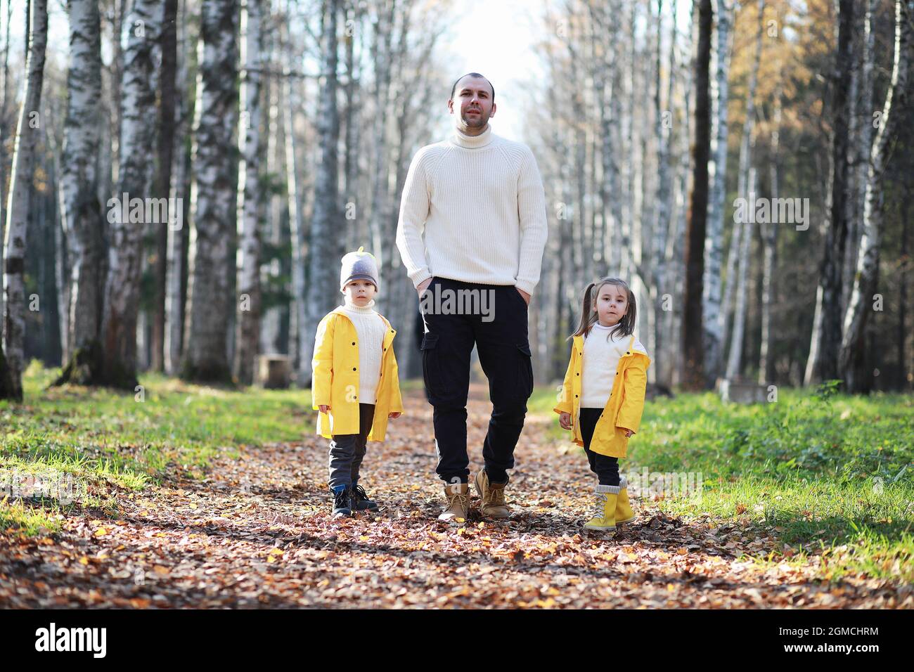 Children walk in the autumn park in the fall Stock Photo - Alamy