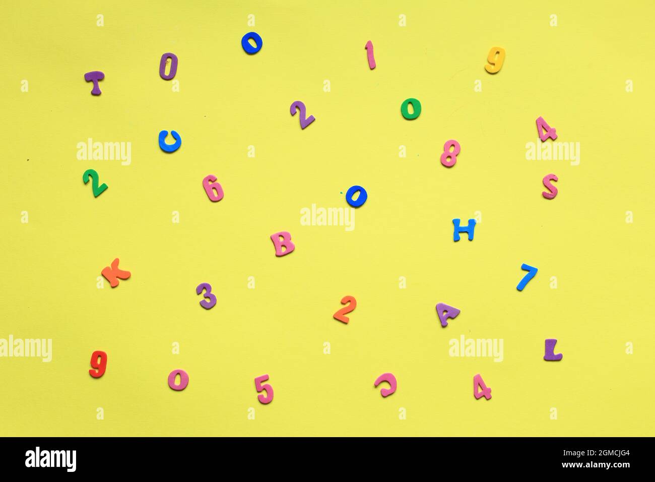 Words from multi colored letters on a yellow background. Expression ...