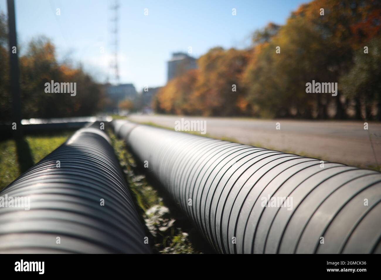 Industrial pipes on street construction Stock Photo - Alamy
