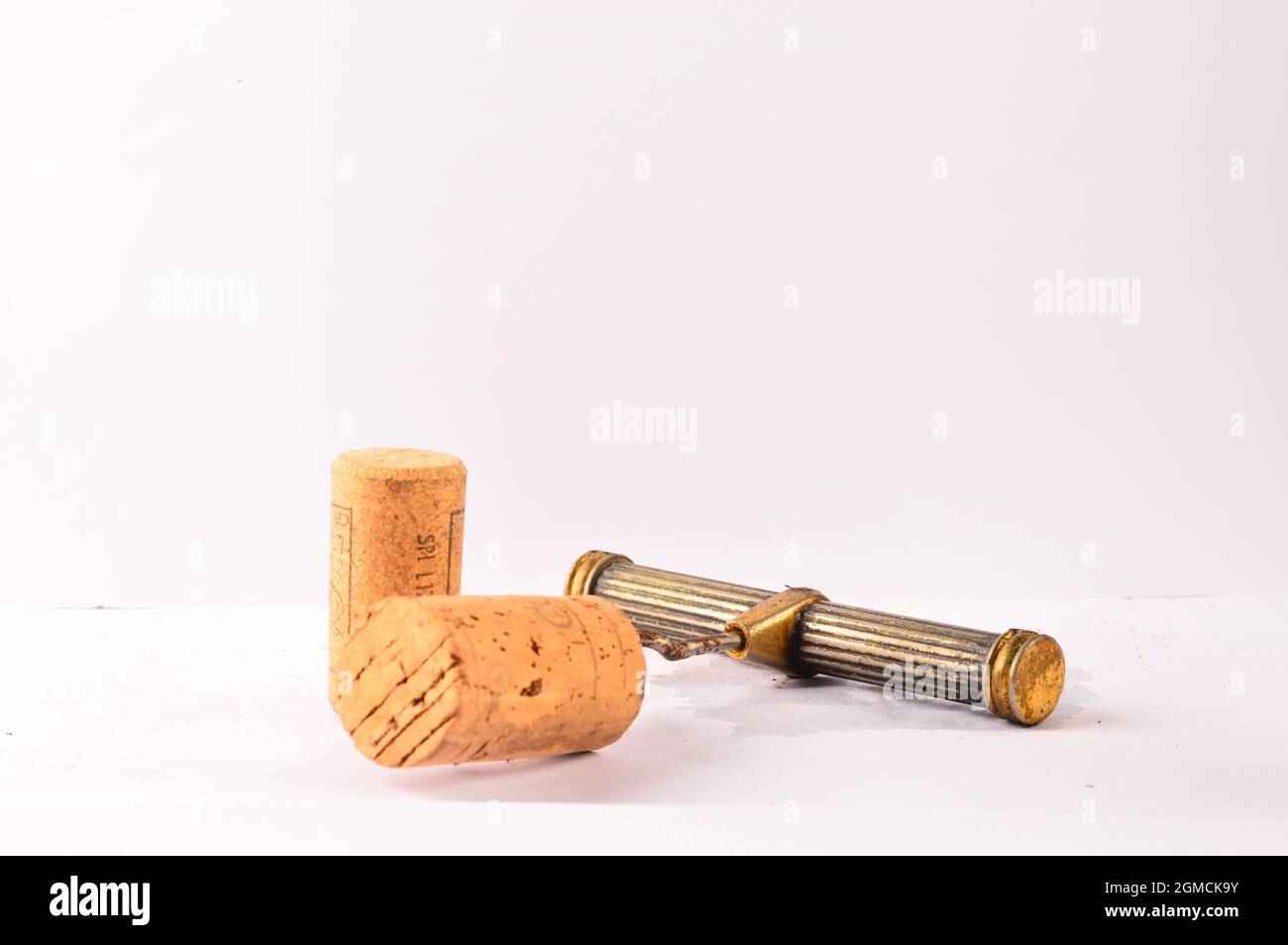 Bottle cork opener on white background Stock Photo - Alamy