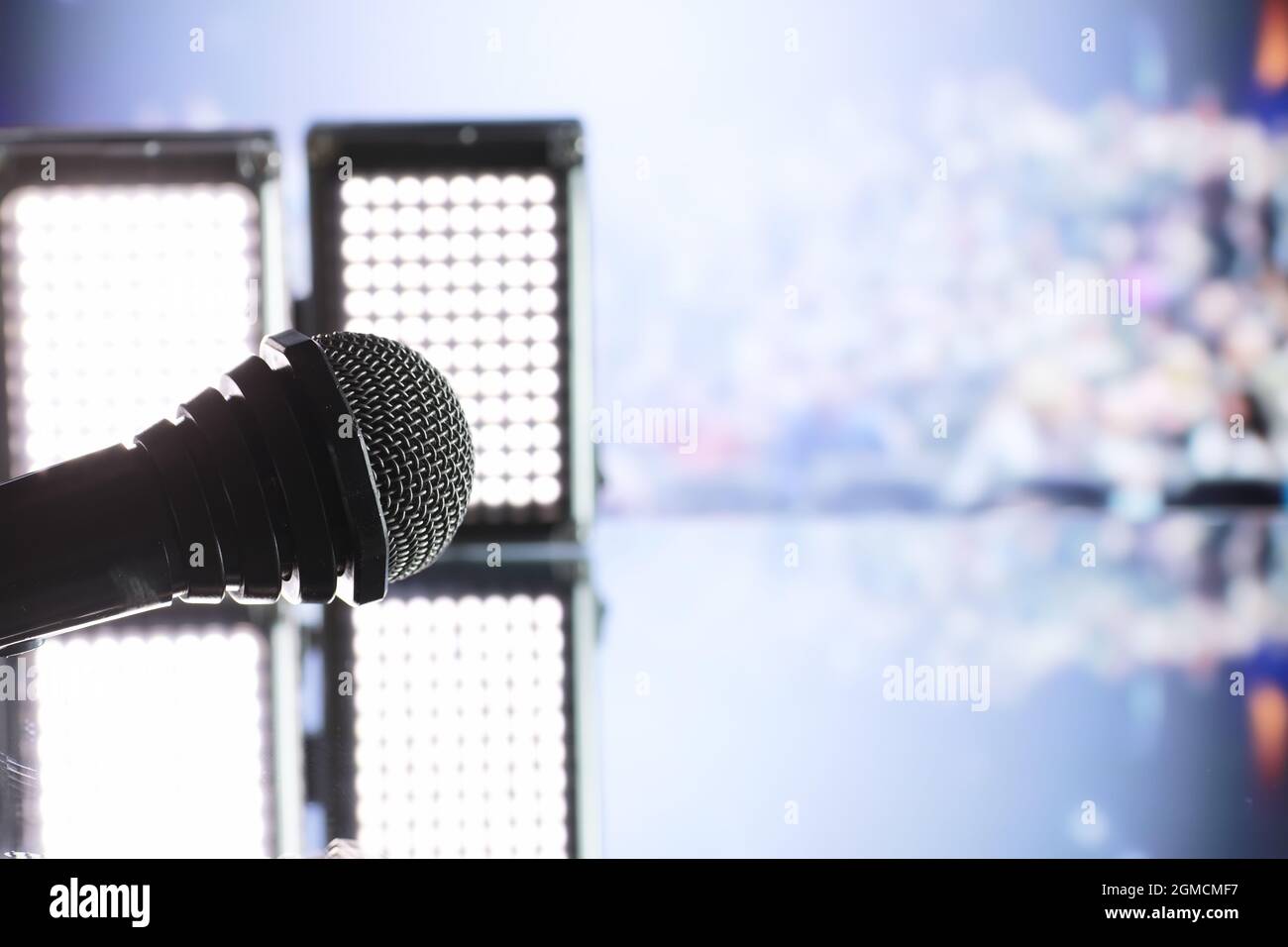 The microphone on the stage in front of the hall. Performance on stage ...