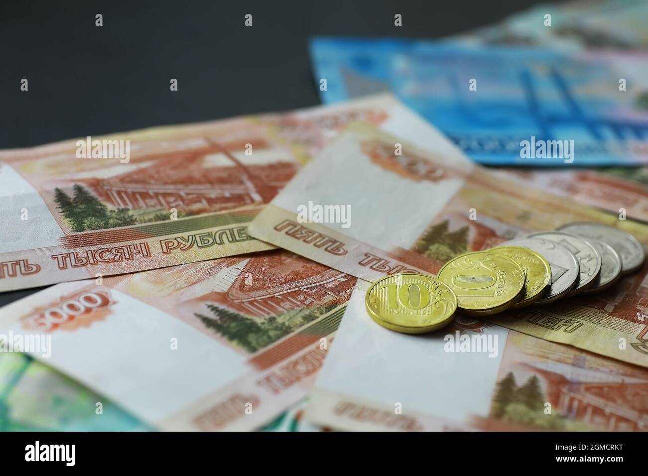 Russian banknotes and coins "rubles." Banknote with inscription "five ...