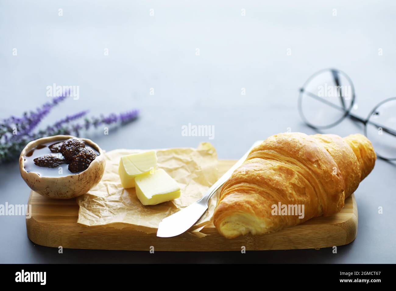 Fresh pastries on the table. French flavored croissant for breakfast ...