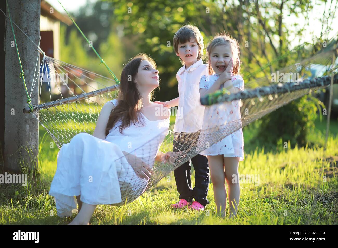 The family is resting in nature. Vacations in the fresh air. Weekend ...
