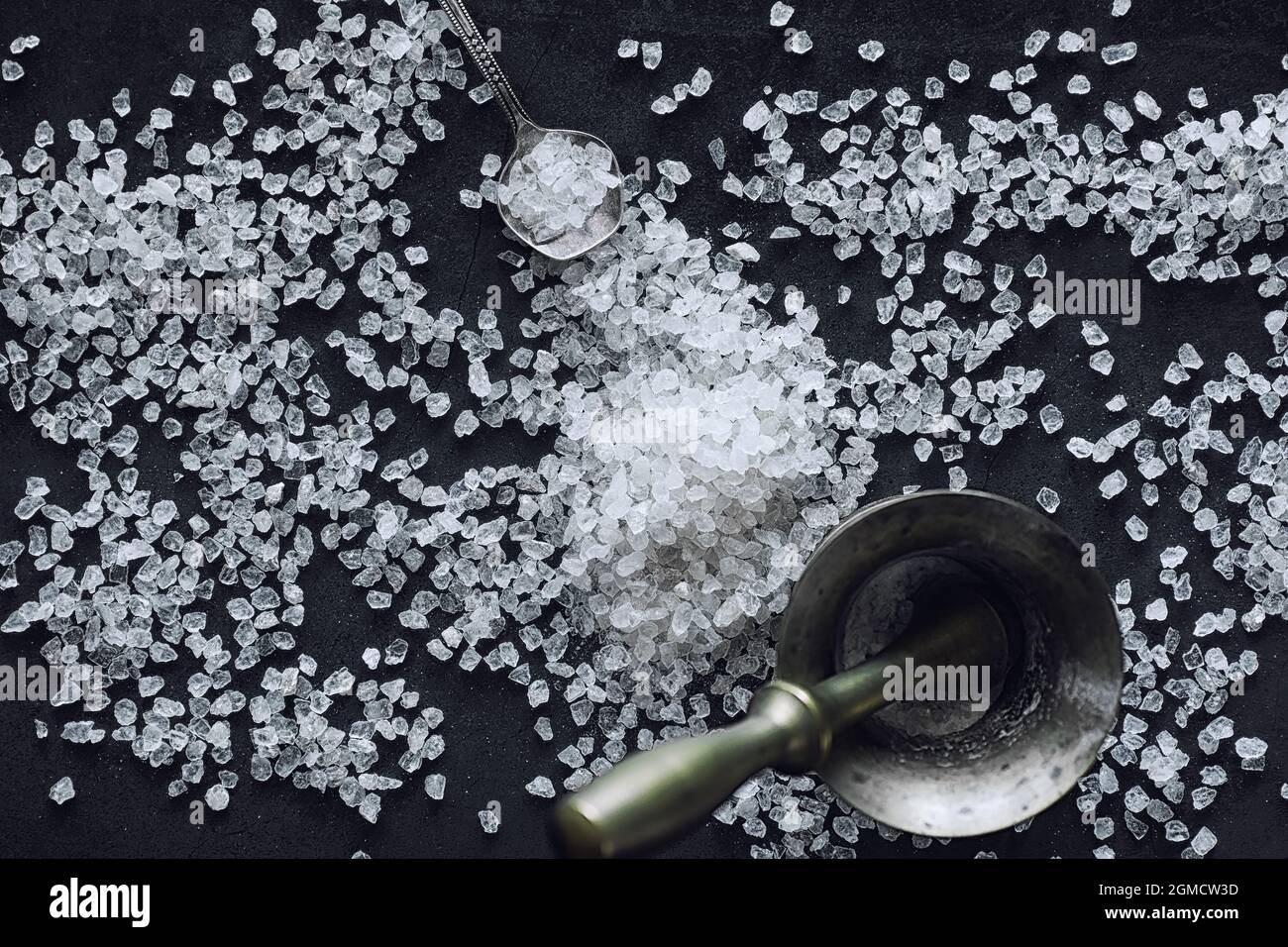 Large sea salt. Spice. Mortar and pestle for grinding salt Stock Photo ...