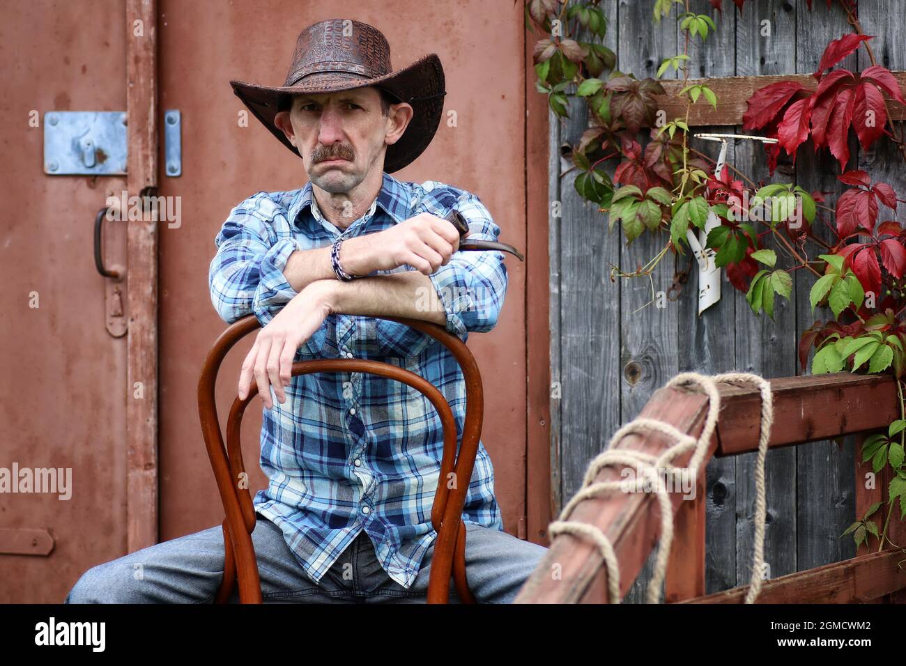 cowboy man smoke pipe Stock Photo - Alamy