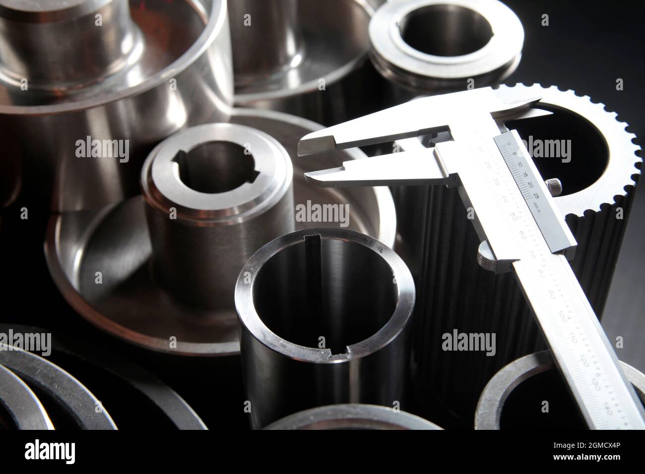 Industrial measuring instrument, cylinder and gear wheel. Factory ...