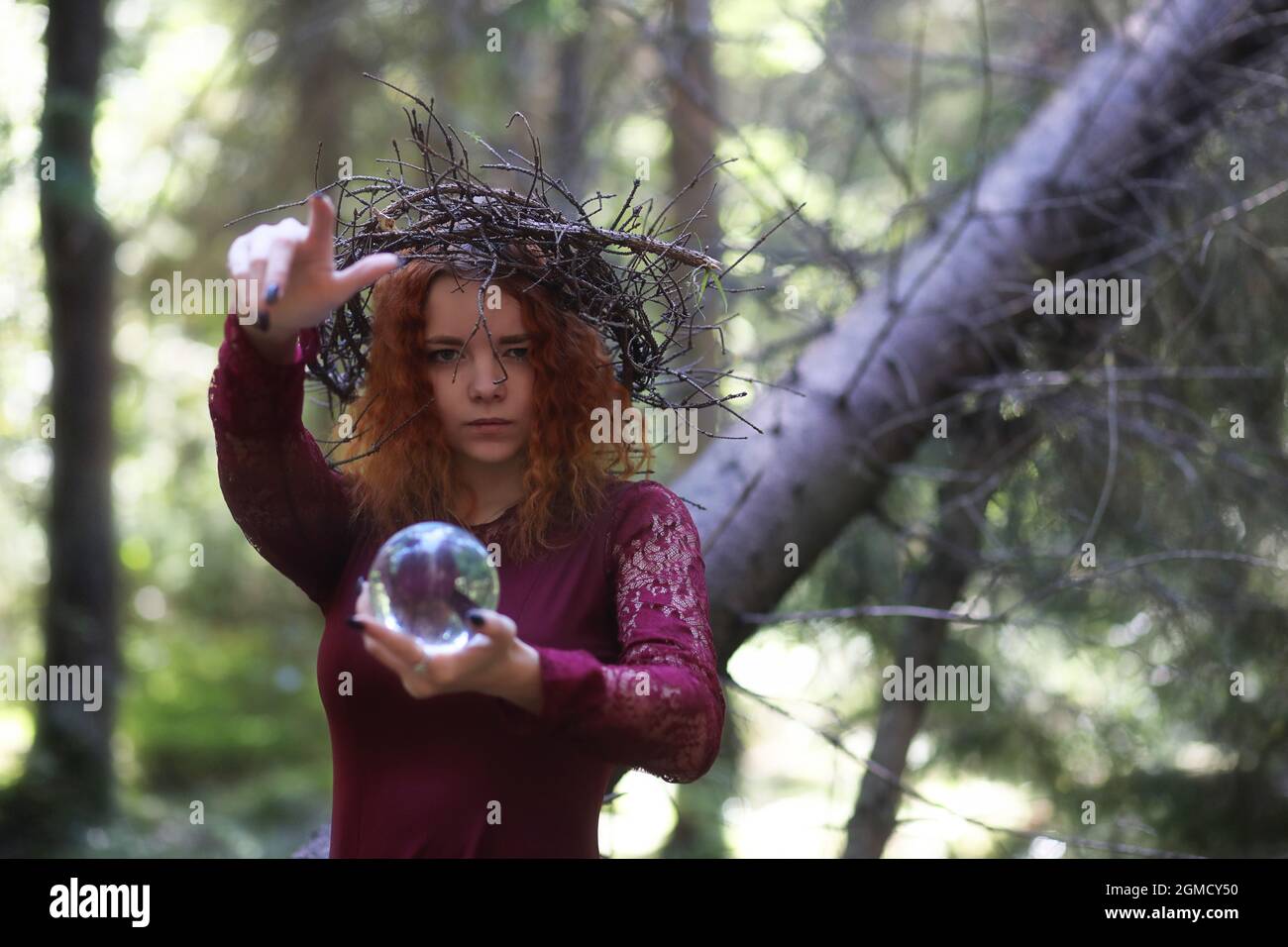 Fortune-teller conducts a ritual in the depths of the forest Stock ...