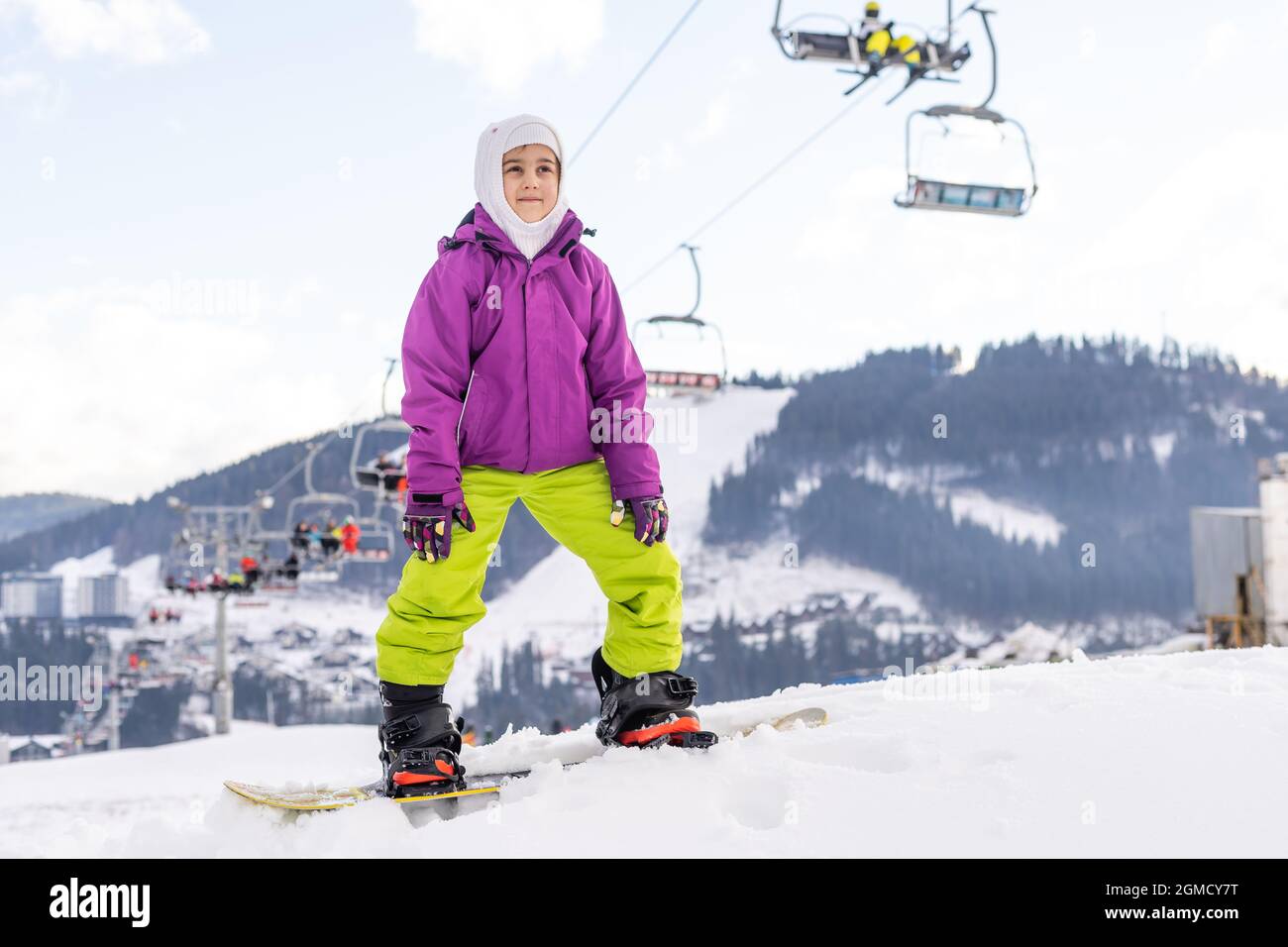 smiley happy little girl with snowboard at winter outdoor Stock Photo ...