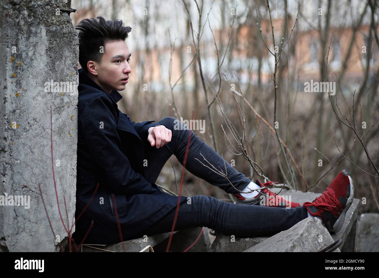 Asian boy teenager in nature season cold weather Stock Photo - Alamy