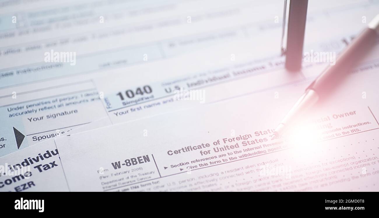 Annual tax reporting. Tax form on the table. Financial statements ...