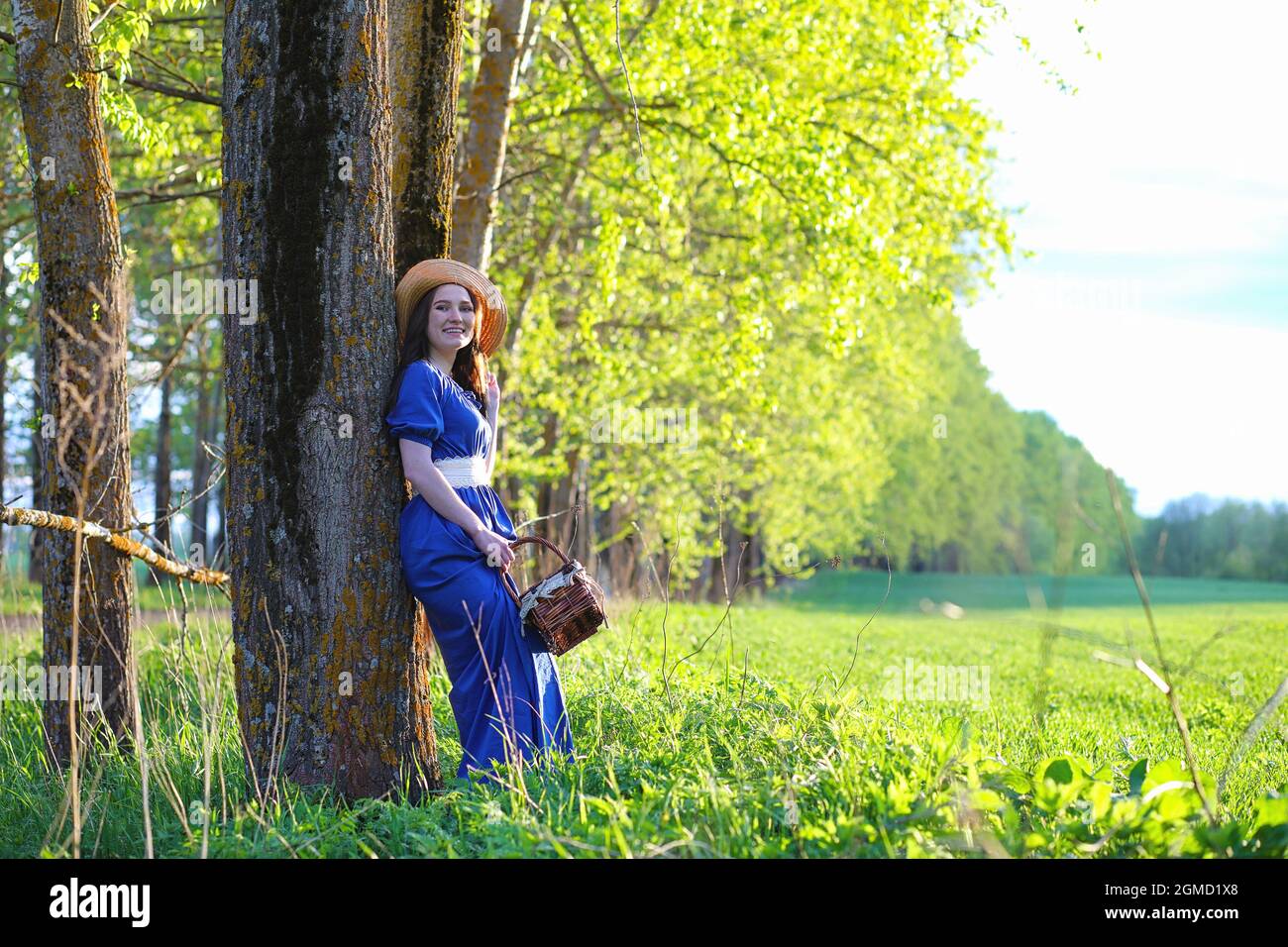 A sweet girl in the countryside on a walk in the sunny evening Stock ...