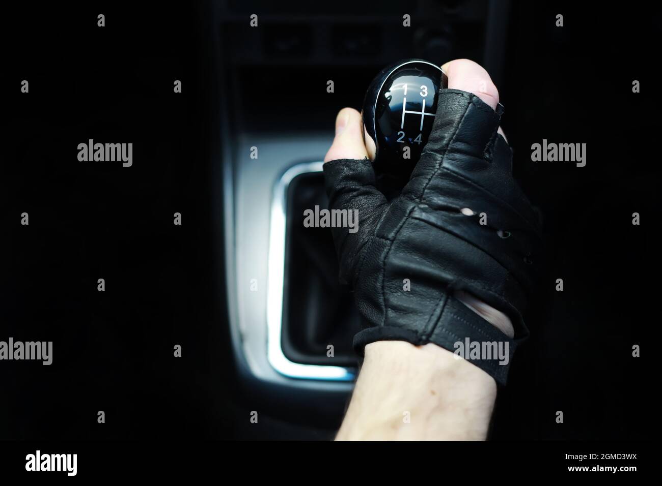 Gear lever. Manual Transmission. Hand on the gear shift in the car ...