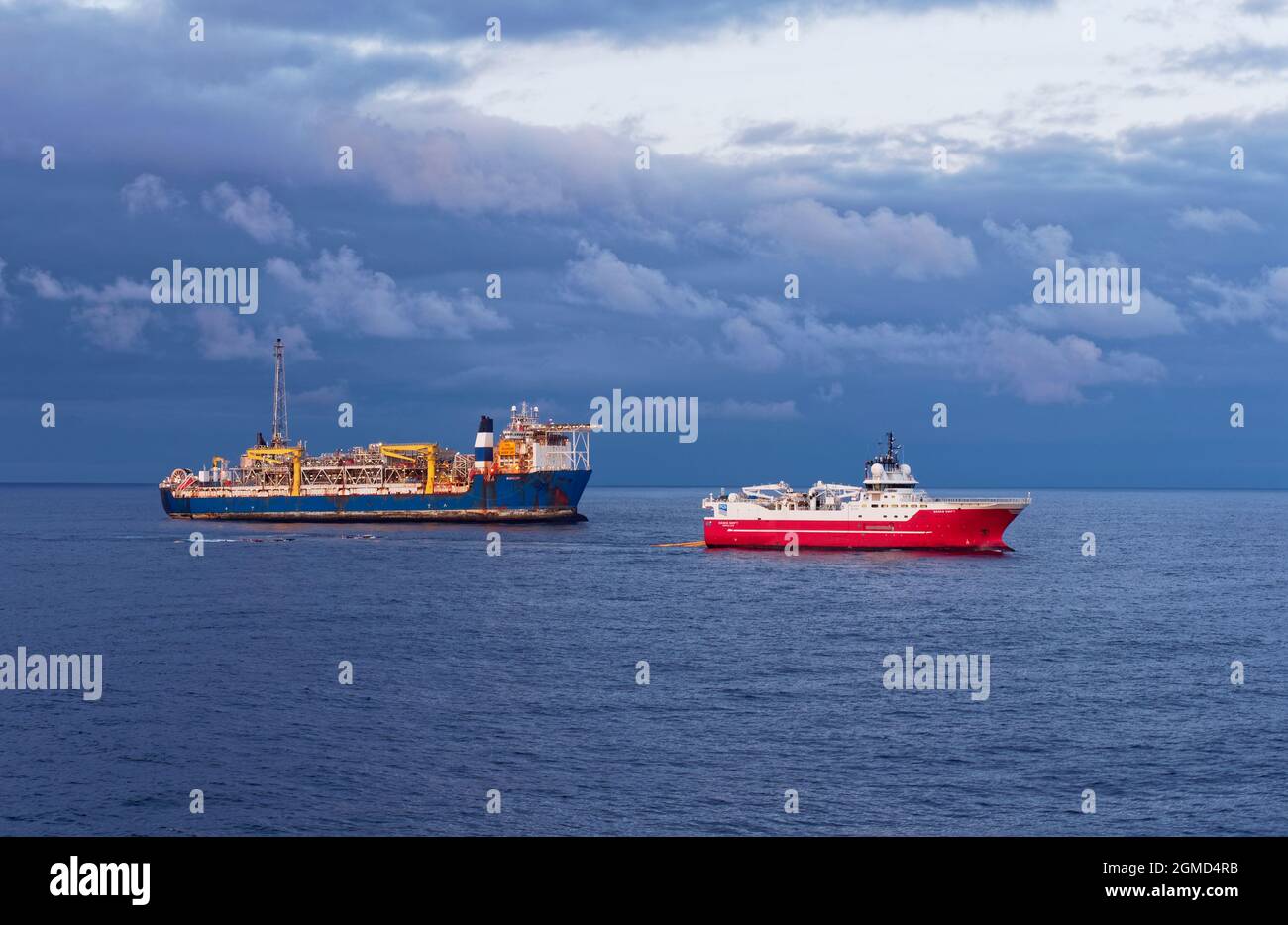 The Sanco Swift Seismic Source Vessel passing by the Alvheim FPSO on a ...