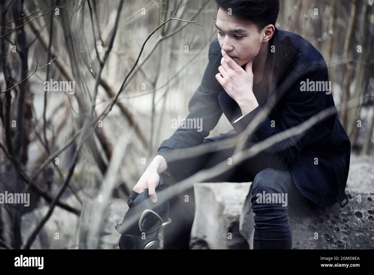 The guy in the coat and gas mask. Post-apocalyptic portrait Asian ...