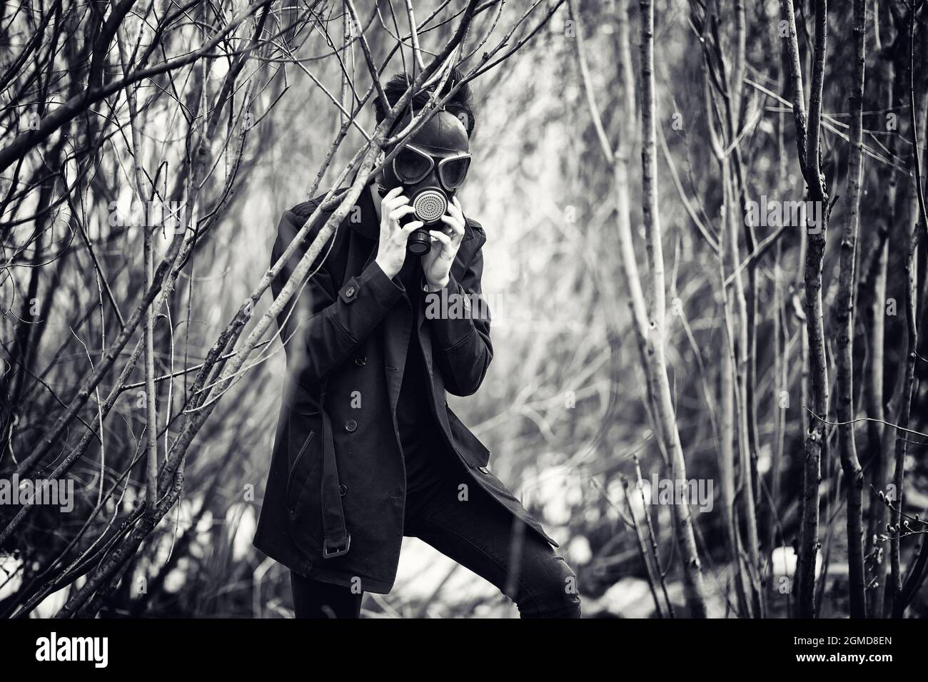 The guy in the coat and gas mask. Post-apocalyptic portrait Asian ...