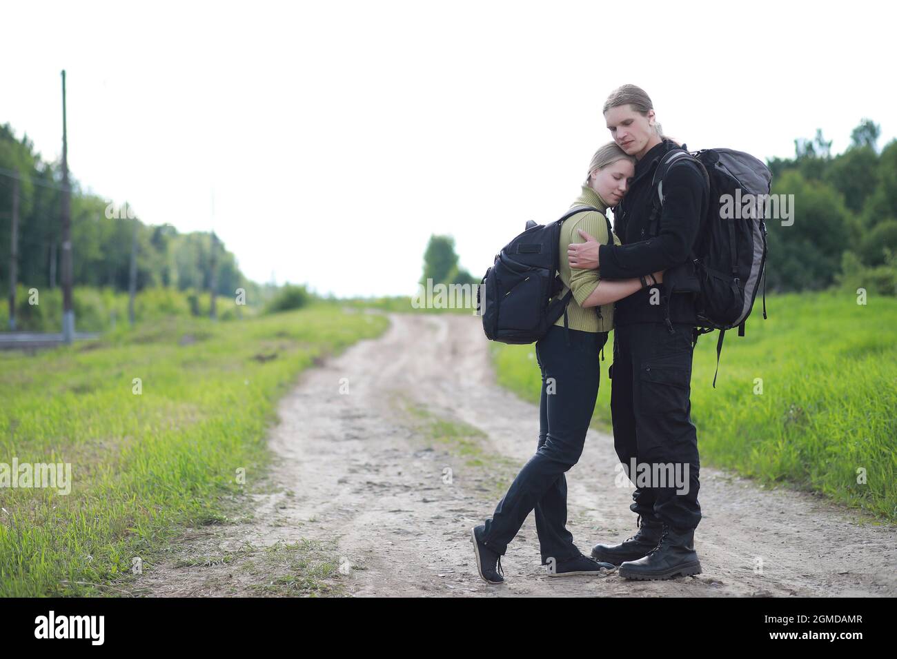Traveling with a backpack on foot and hitchhiking Stock Photo - Alamy