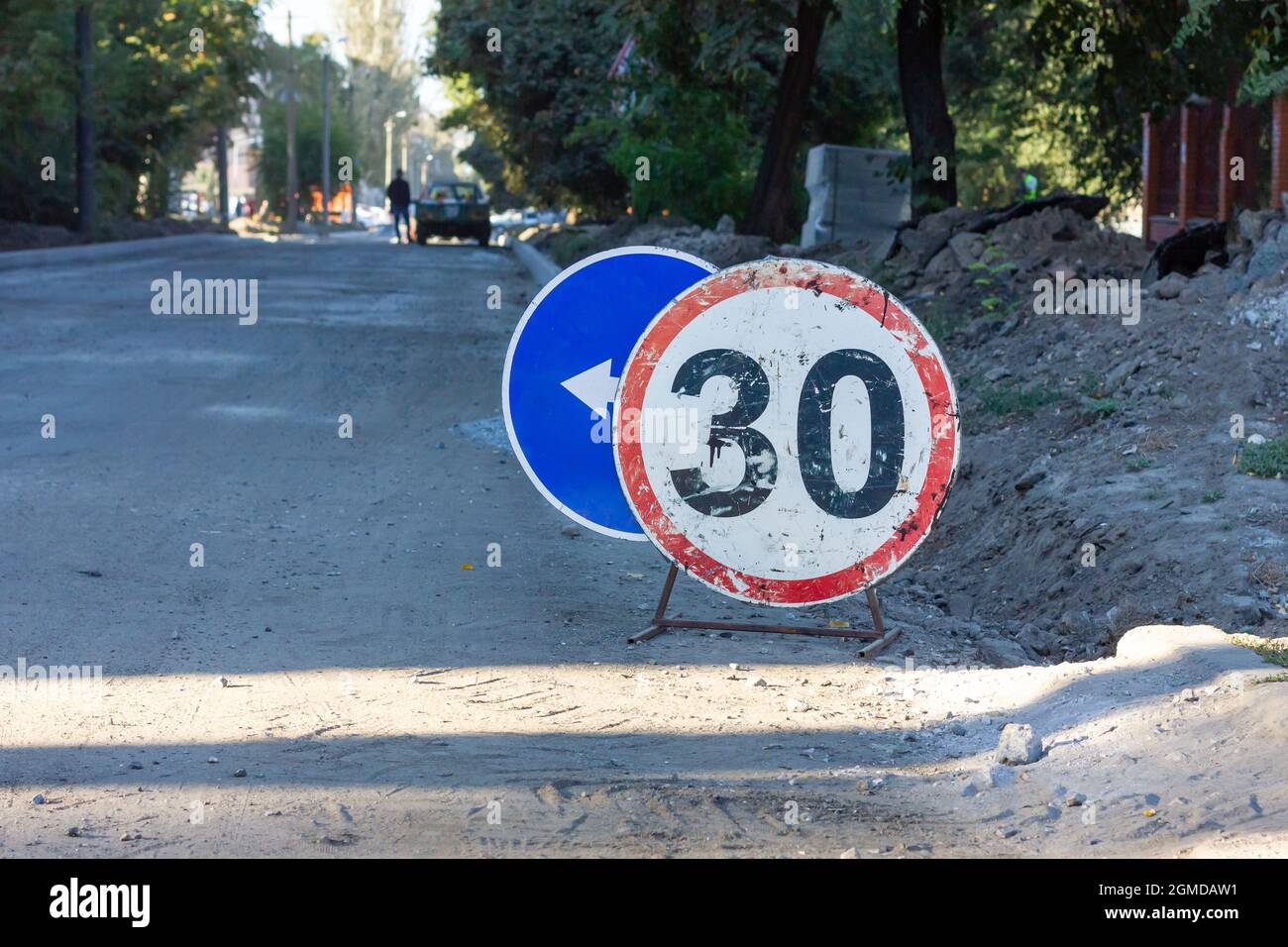 Road signs. Blocked road. Road works. Damaged road surface Stock Photo ...