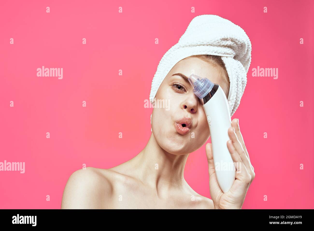 woman with towel on head cleaning skin therapy cosmetics technology ...