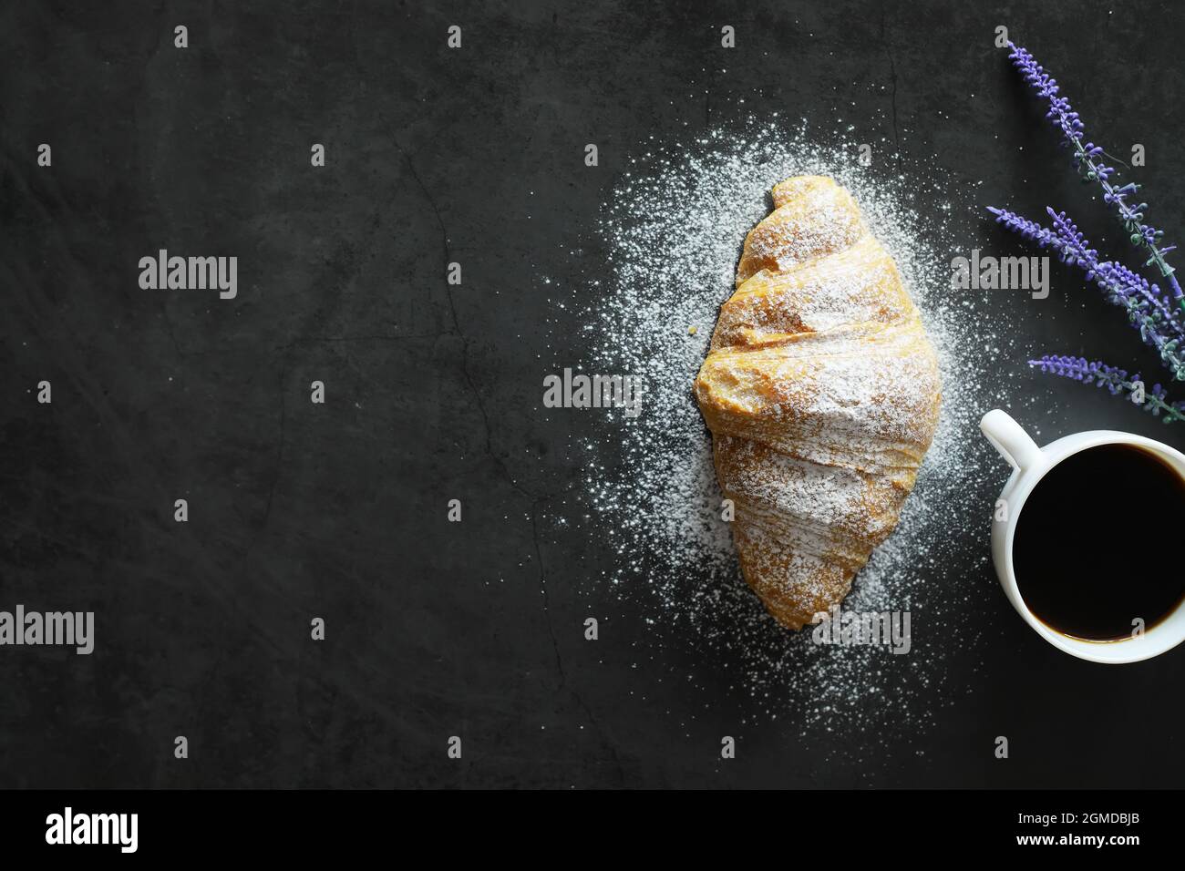 Fresh pastries on the table. French flavored croissant for breakfast ...