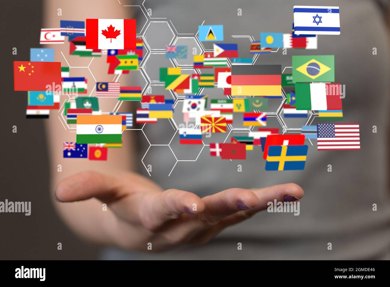 Male hands with 3D render of World map and their flags Stock Photo - Alamy