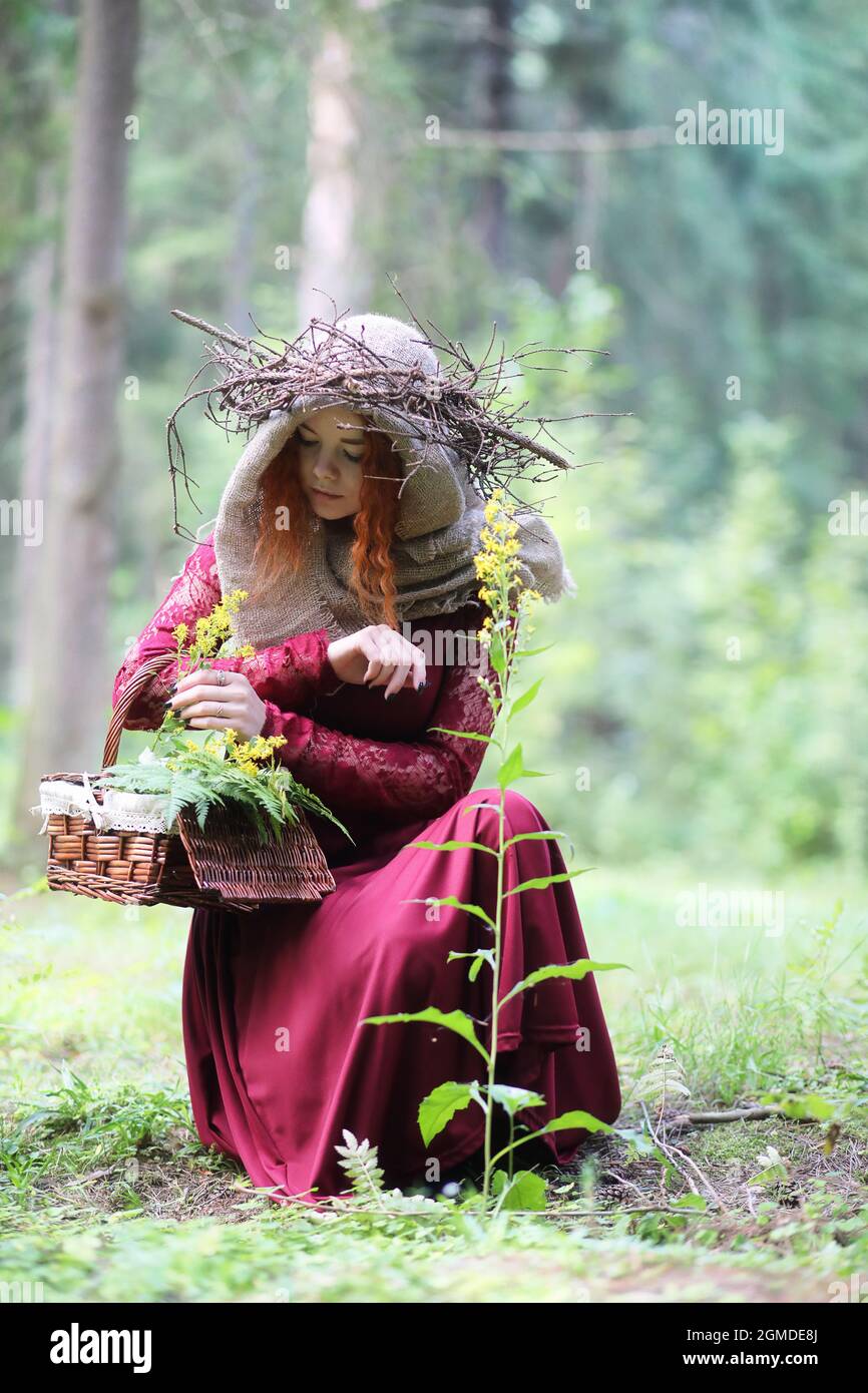 Fortune-teller conducts a ritual in the depths of the forest Stock ...