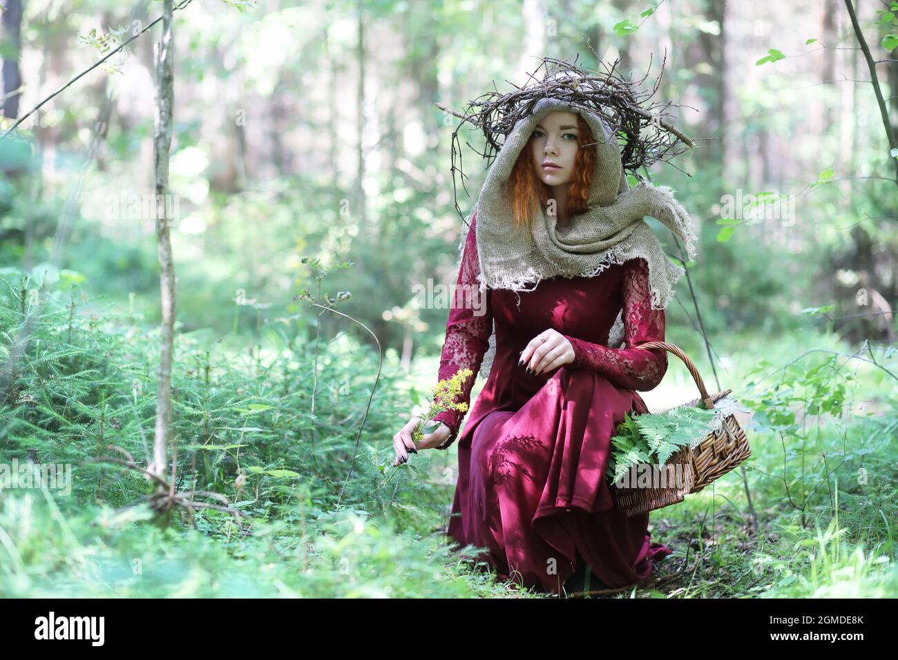 Fortune-teller conducts a ritual in the depths of the forest Stock ...