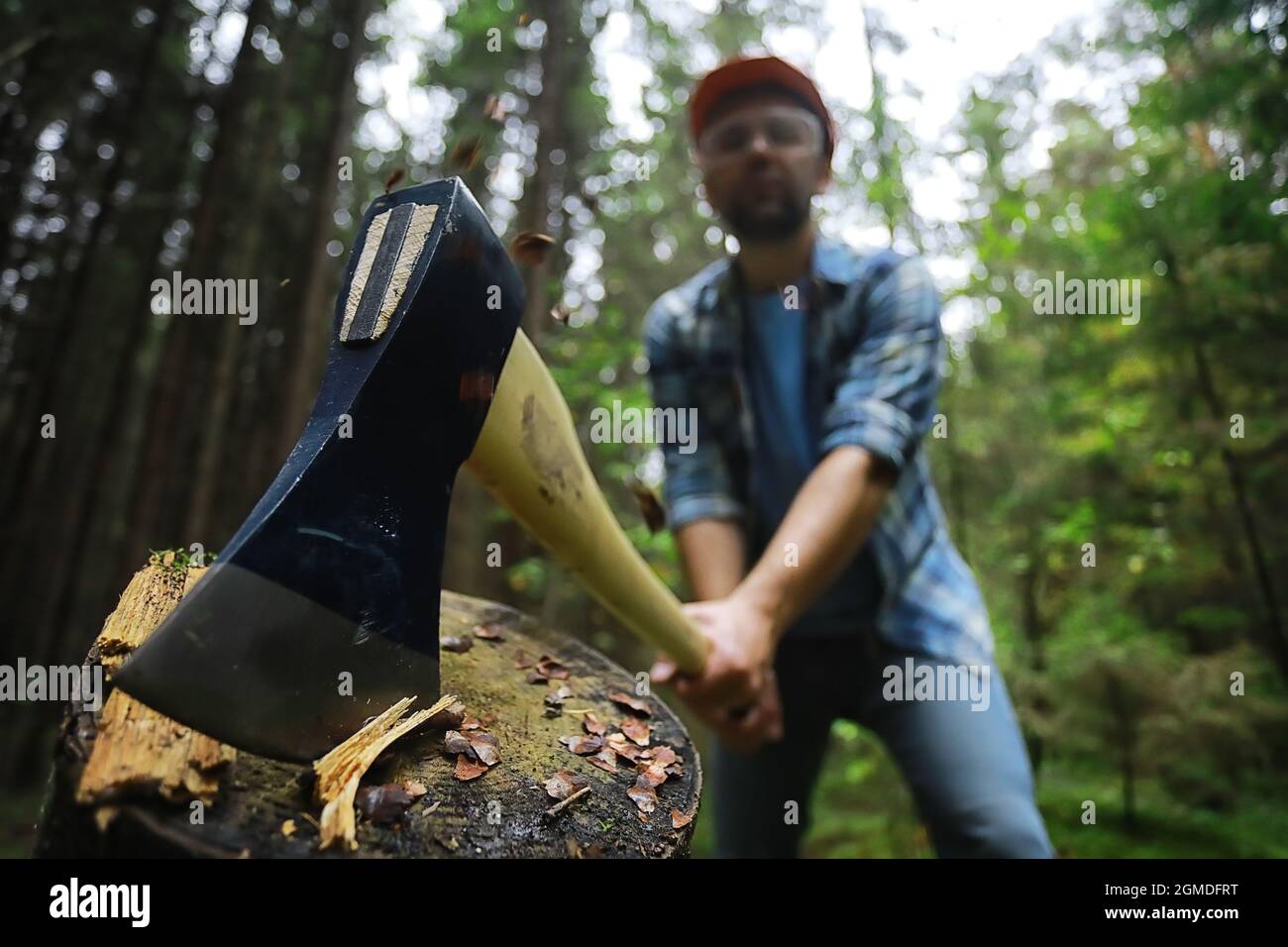 Lumberman chopping wood ax close hi-res stock photography and images ...