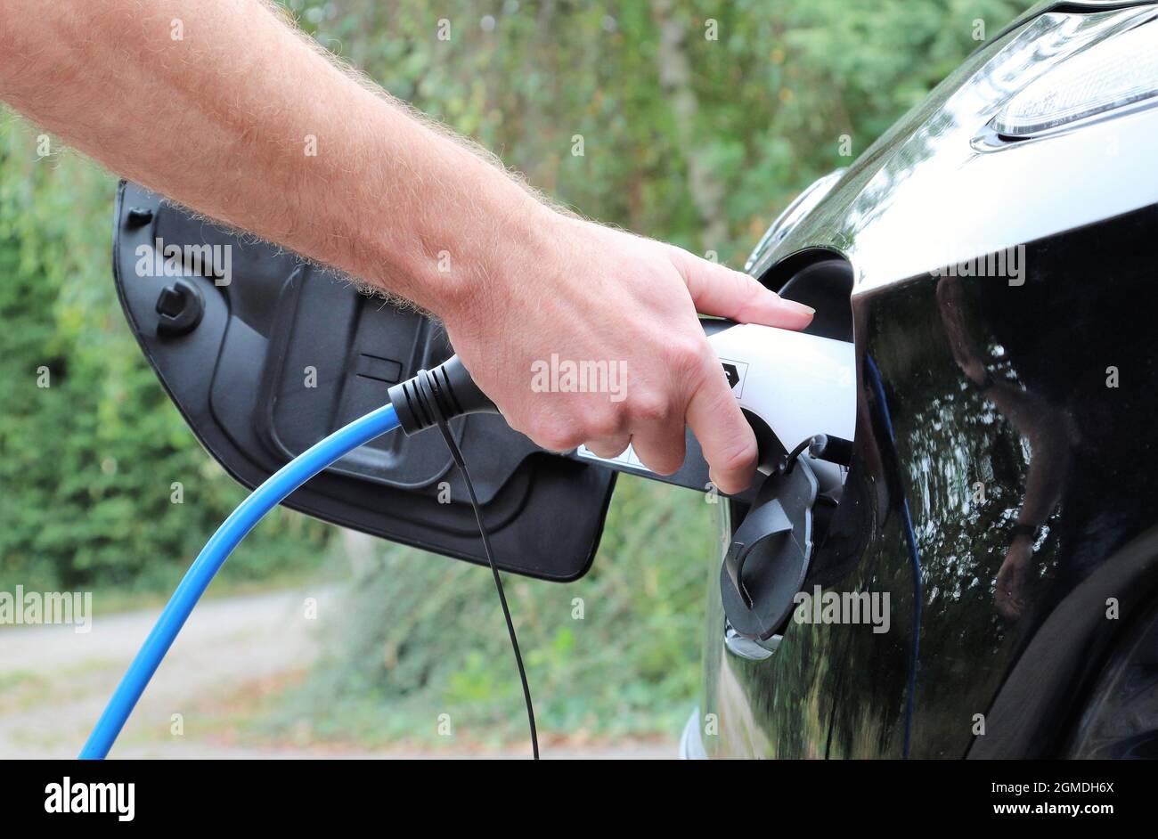 Plugging in hi-res stock photography and images - Alamy