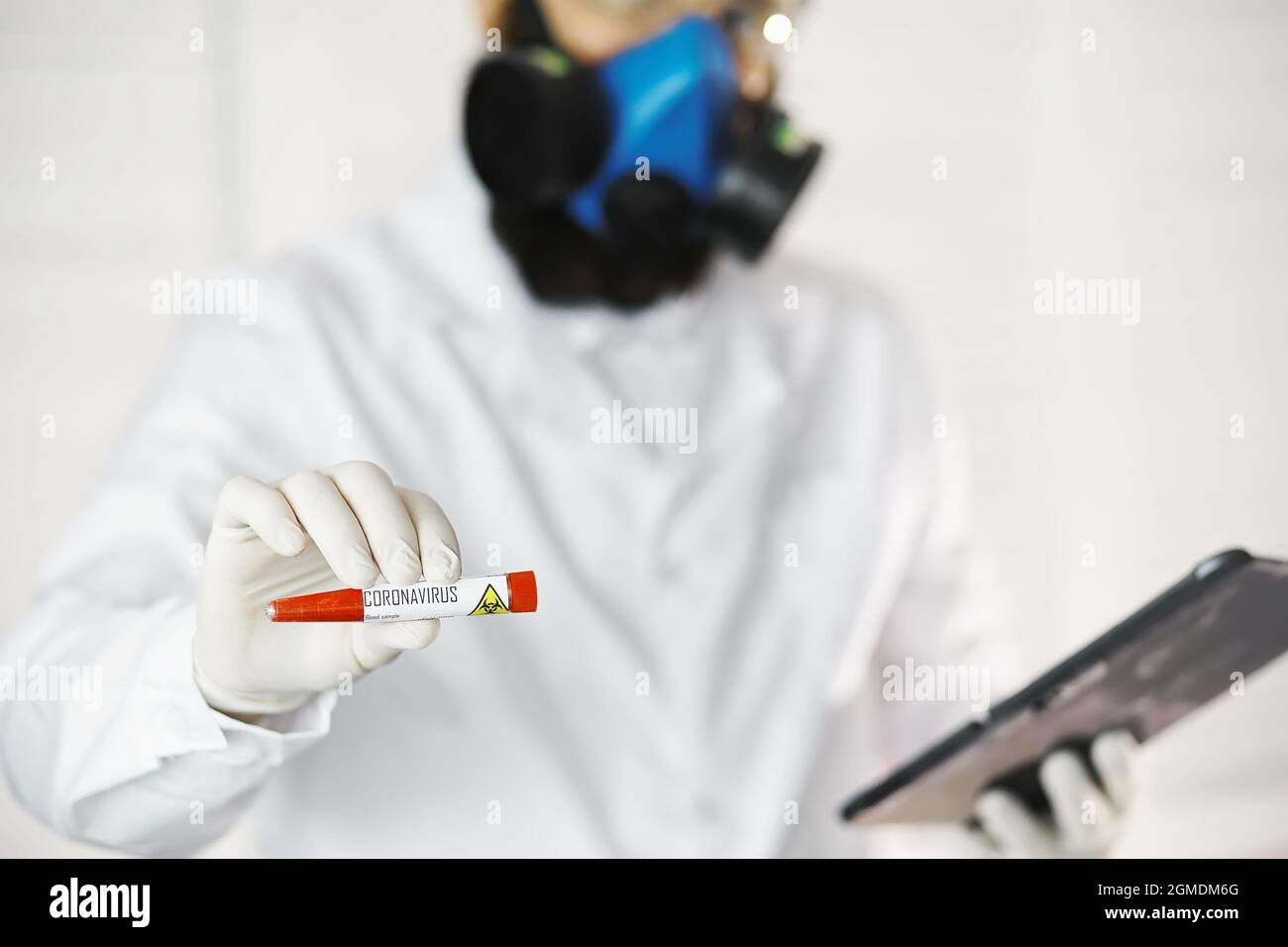 A scientist researcher in the laboratory is testing drugs for treatment ...
