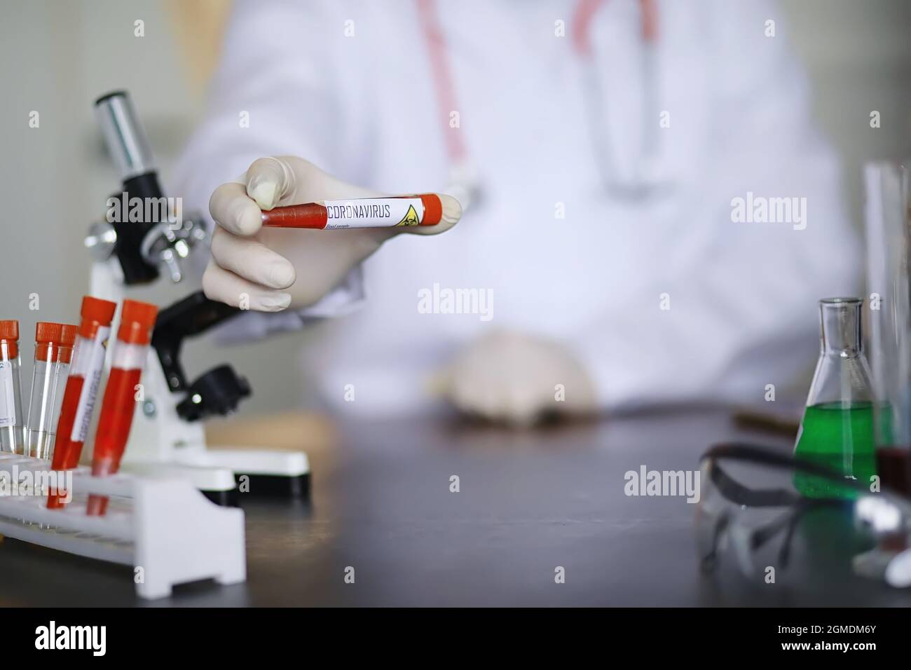 A scientist researcher in the laboratory is testing drugs for treatment ...