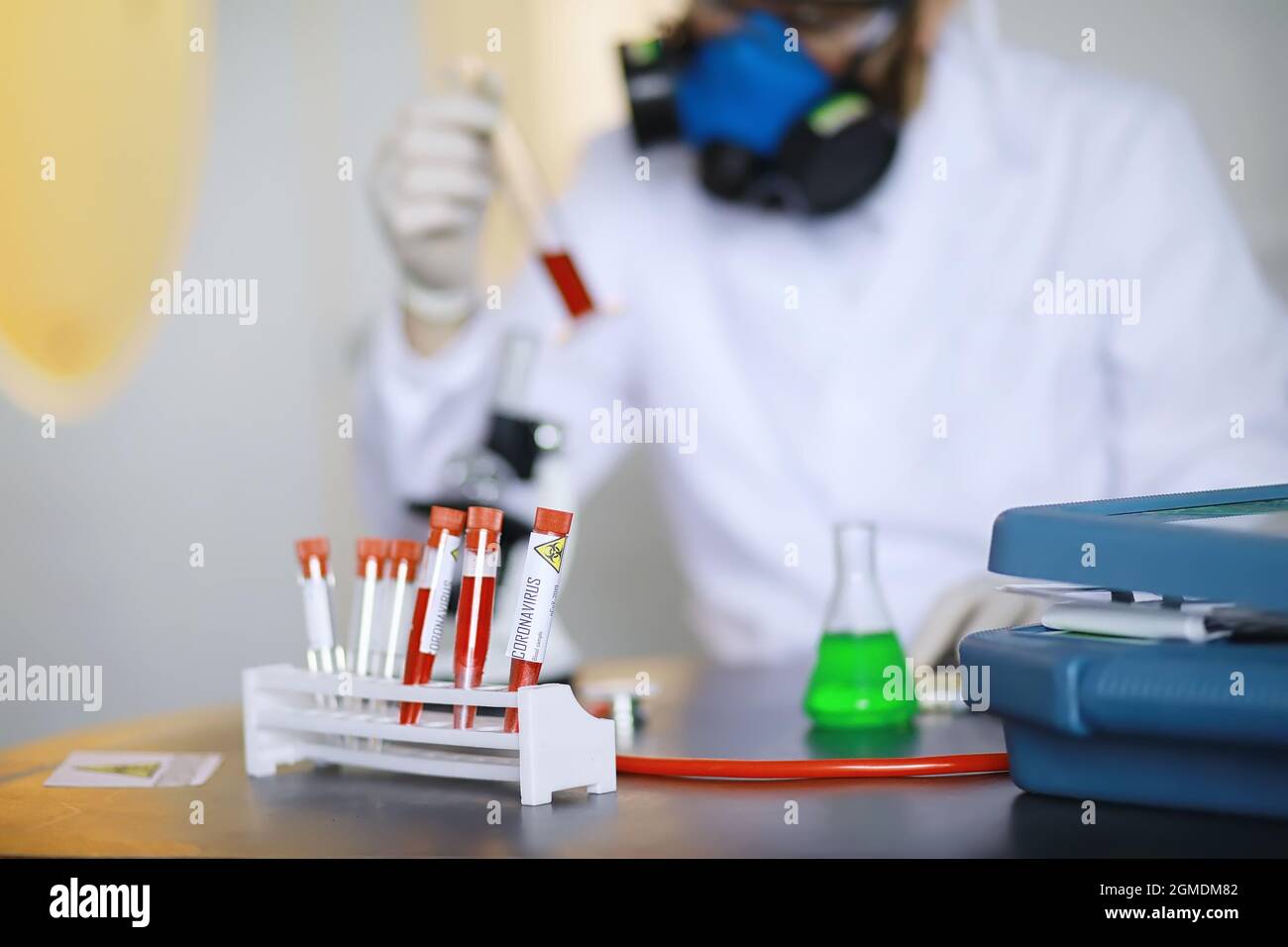 A scientist researcher in the laboratory is testing drugs for treatment ...